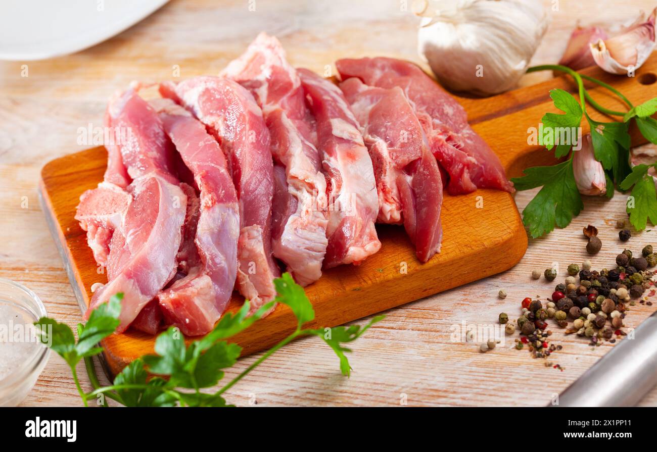 Raw turkey thigh chops Stock Photo - Alamy