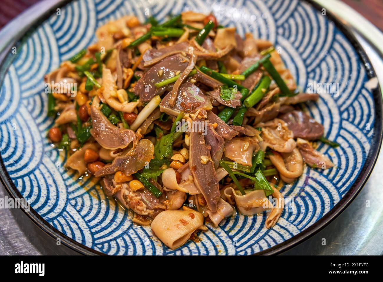 A delicious Chinese dish, cold goose offal Stock Photo - Alamy