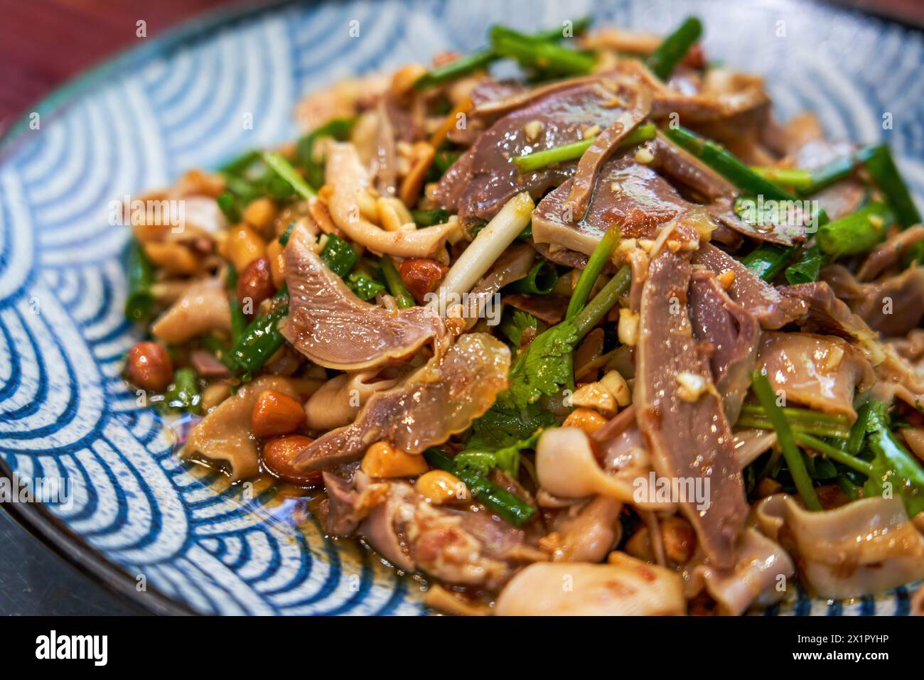 A delicious Chinese dish, cold goose offal Stock Photo - Alamy