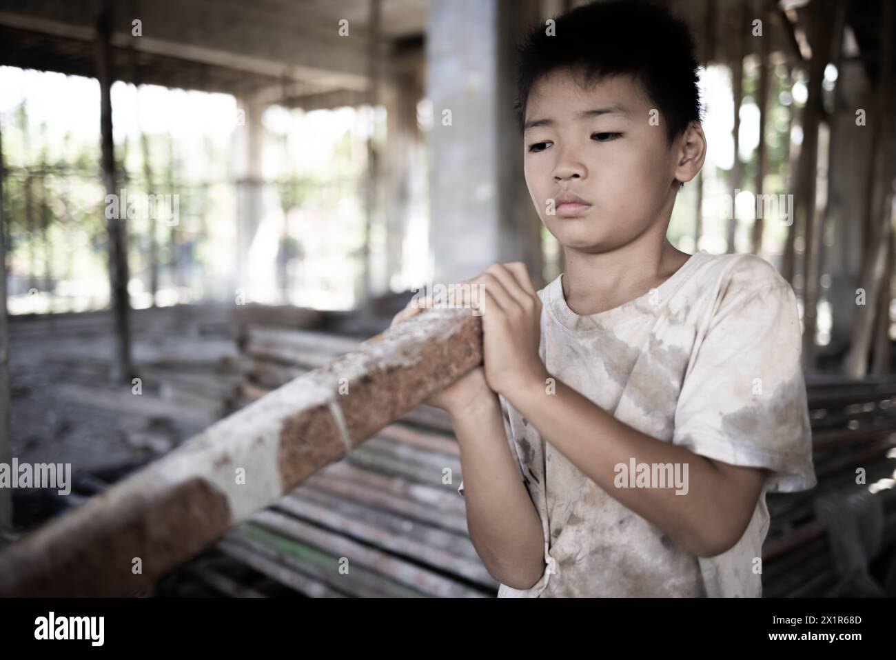 Poor children at the construction site were forced to work. Concept ...