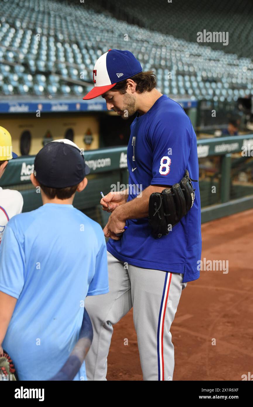 Texas Rangers shortstop Josh Smith (8) signs an autograph during the ...