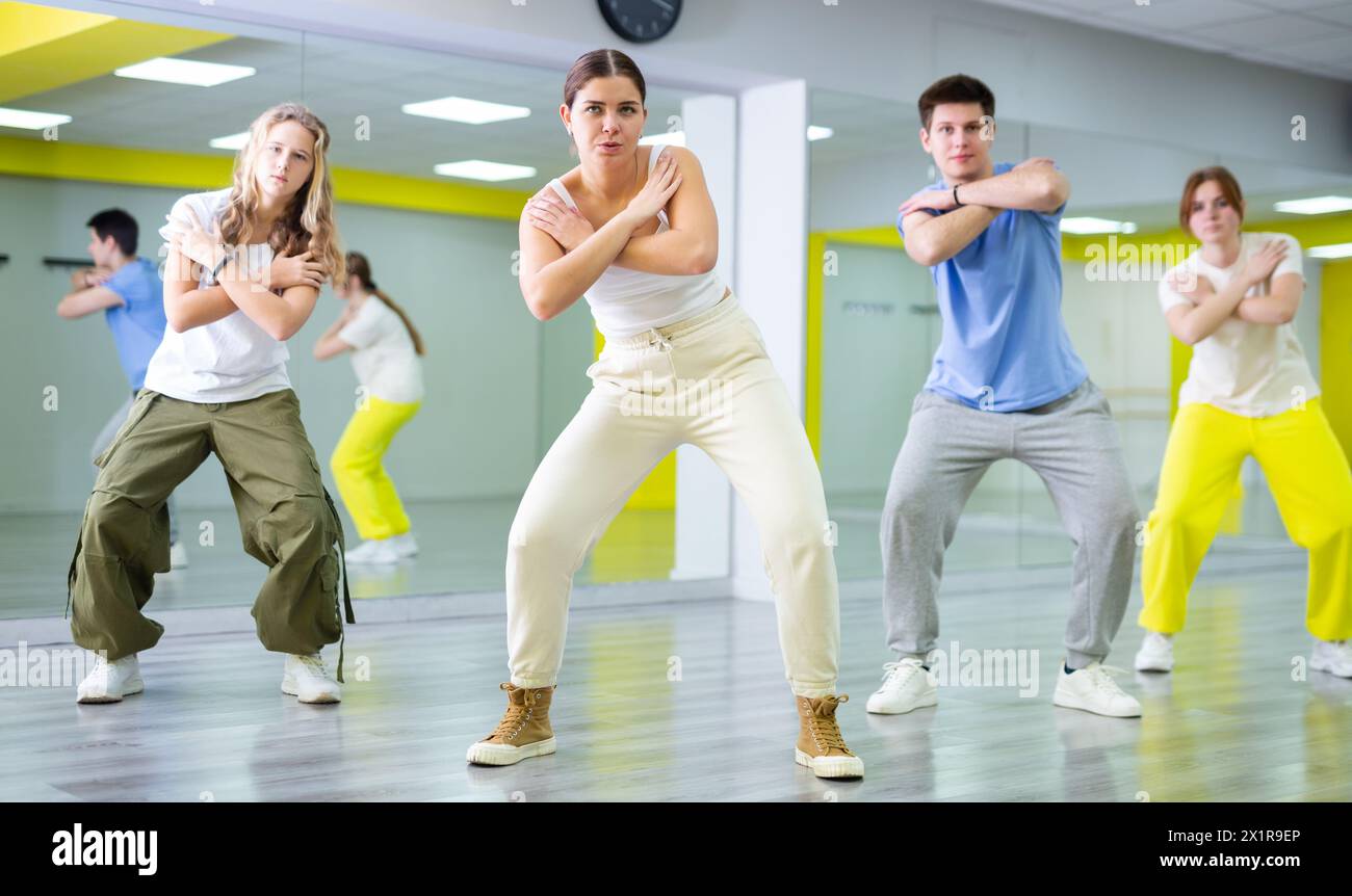 Dancer boys and girls showing different tricks and movements while ...