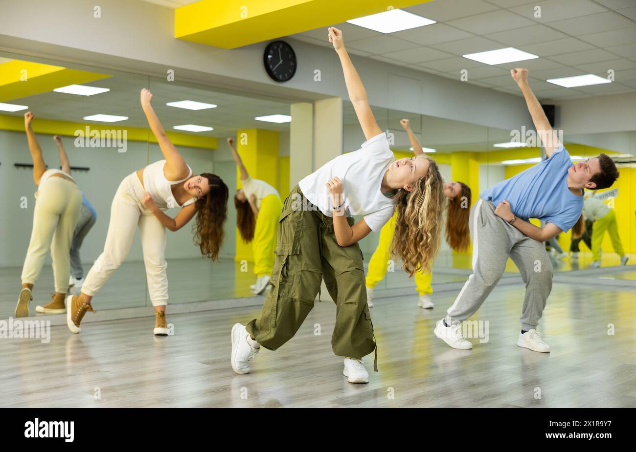 Dancer boys and girls showing different tricks and movements while ...