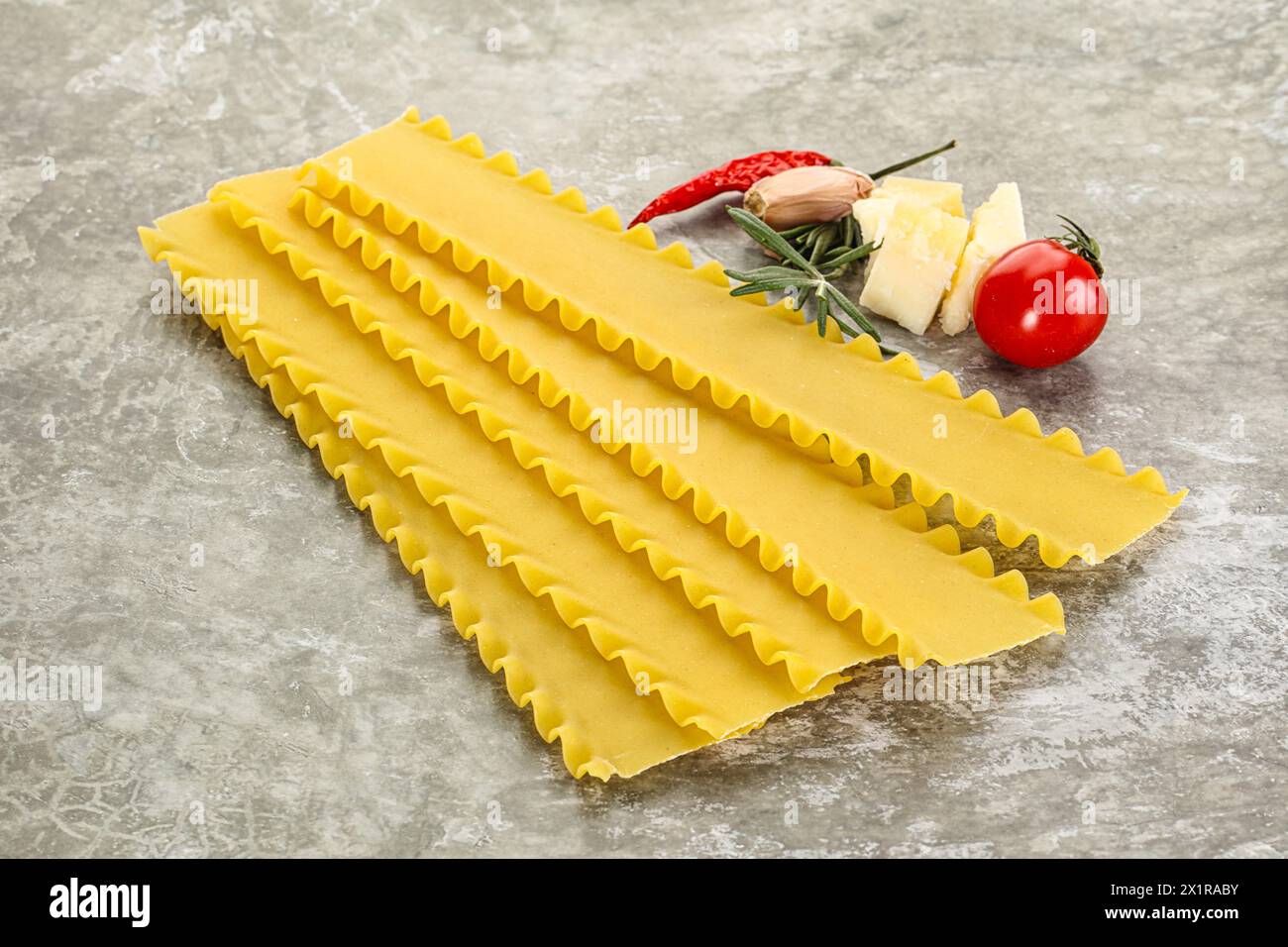 Uncooked raw Lasagna dry sheets for bake Stock Photo - Alamy