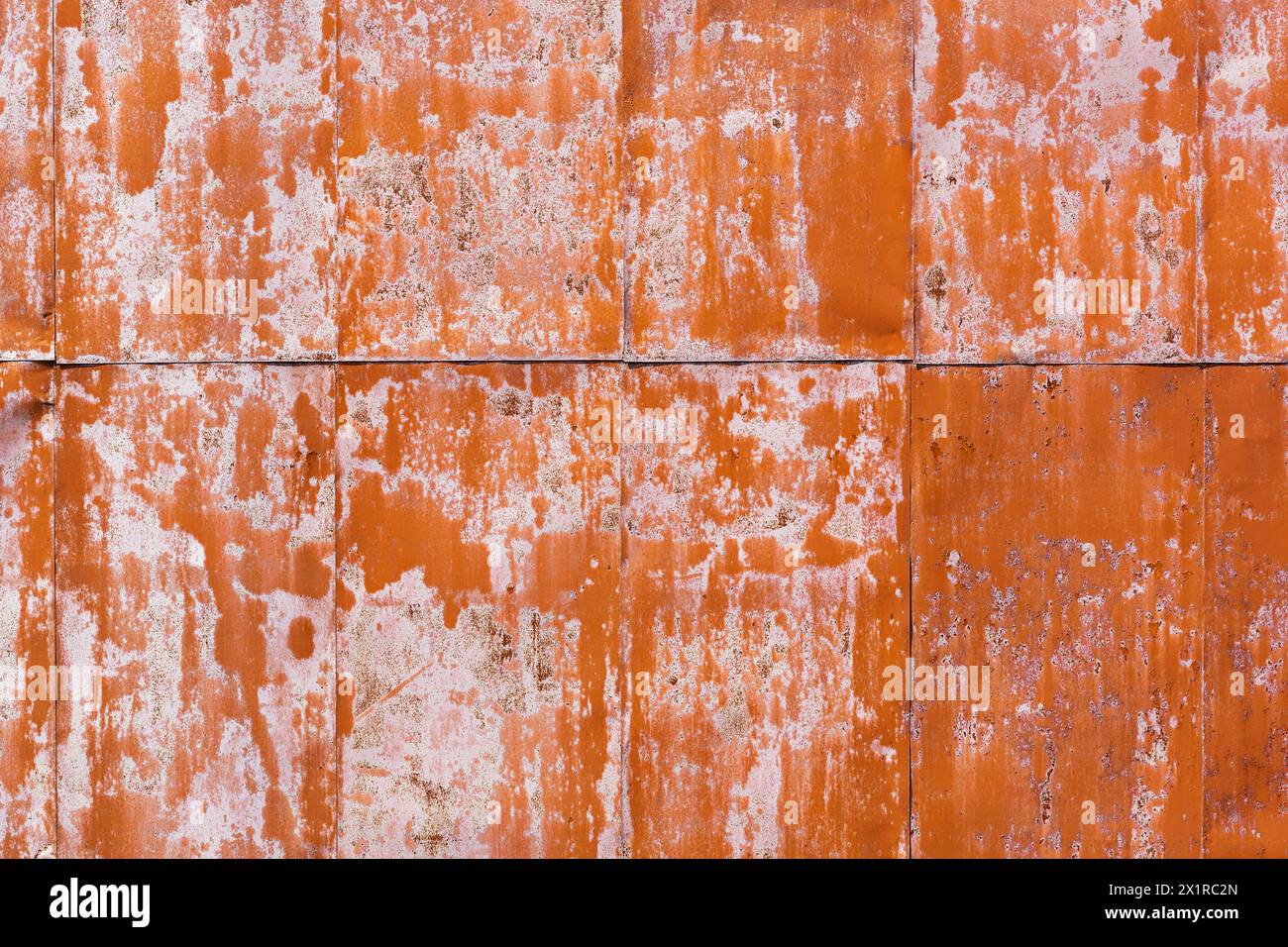 rusty metal sheet painted red. shabby background of industrial building ...