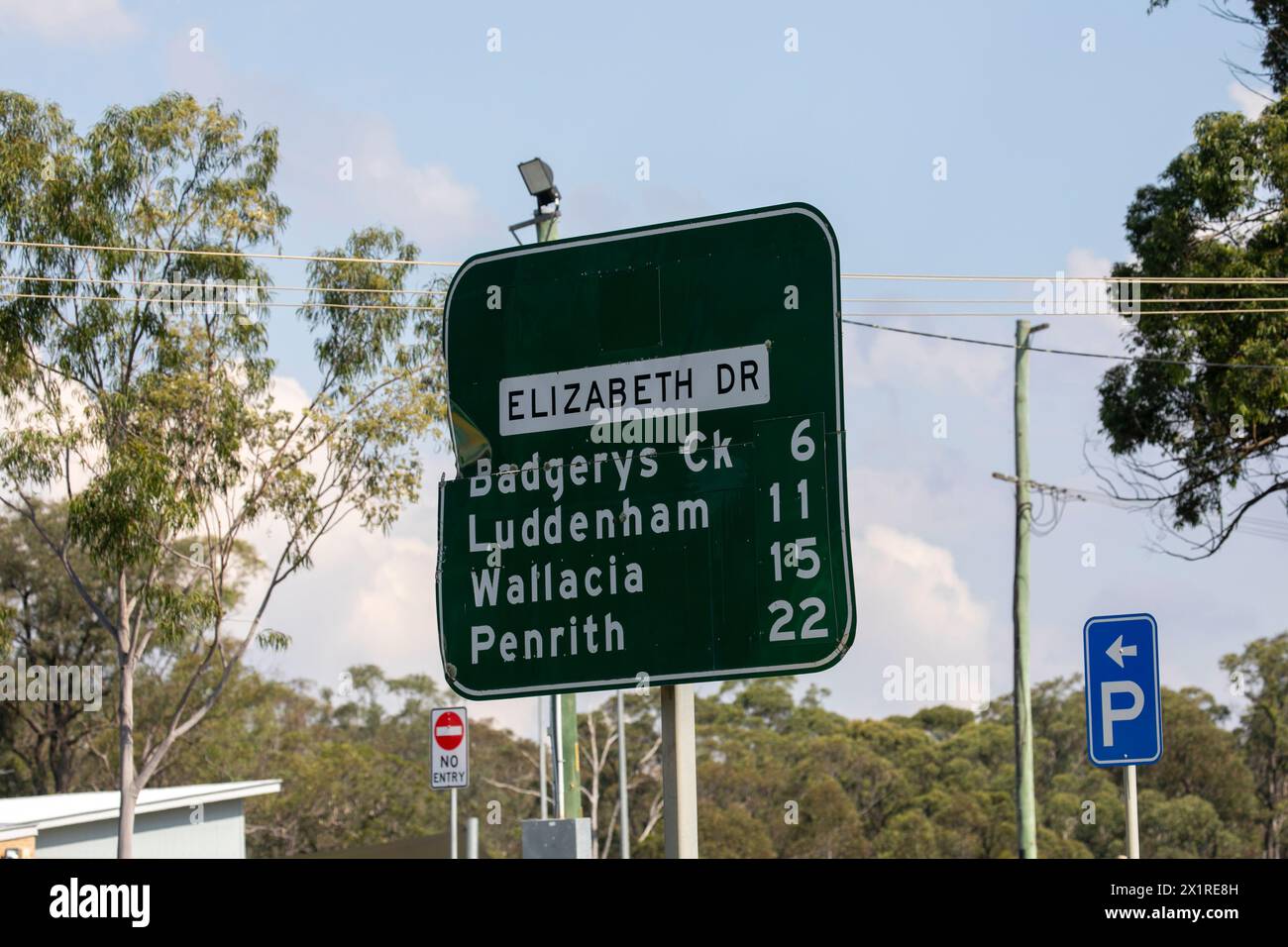Road sign on Elizabeth Drive in Kemps Creek, with driving distances to ...