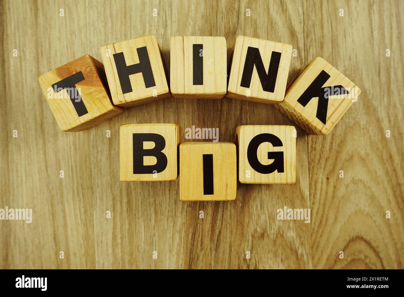 think big word made from wooden cubes with letters alphabet Stock Photo ...