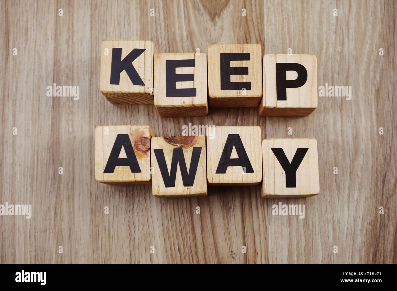 keep away wooden letters alphabet Stock Photo - Alamy