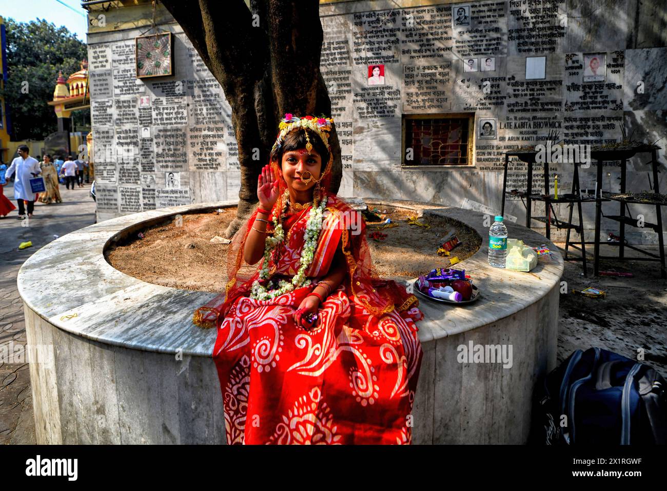 A little girl seen poses for a photo before the ritual of Kumari Puja ...