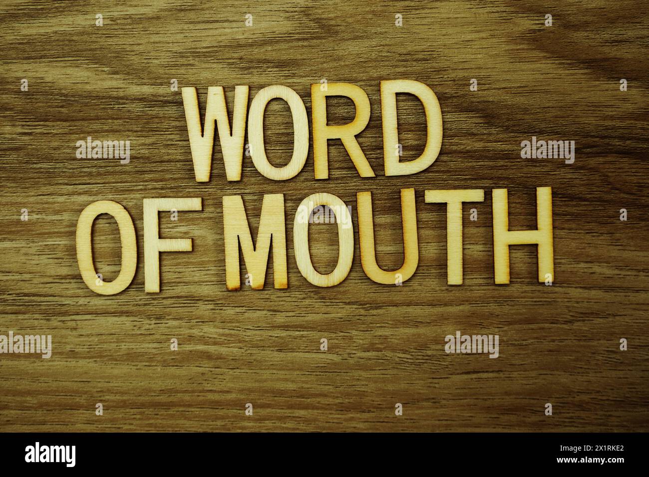 Word Of Mouth text message on wooden background Stock Photo - Alamy