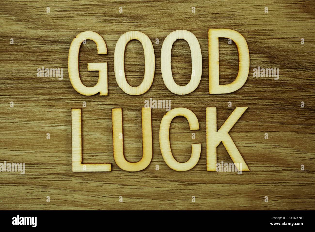 Good Luck text message on wooden background Stock Photo - Alamy
