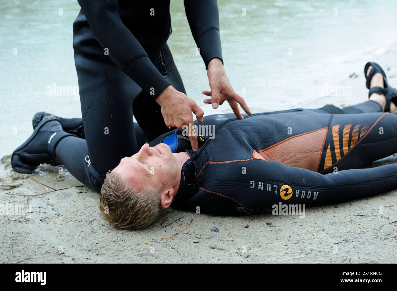 Lifeguard diver showing position of drowning body before doing ...