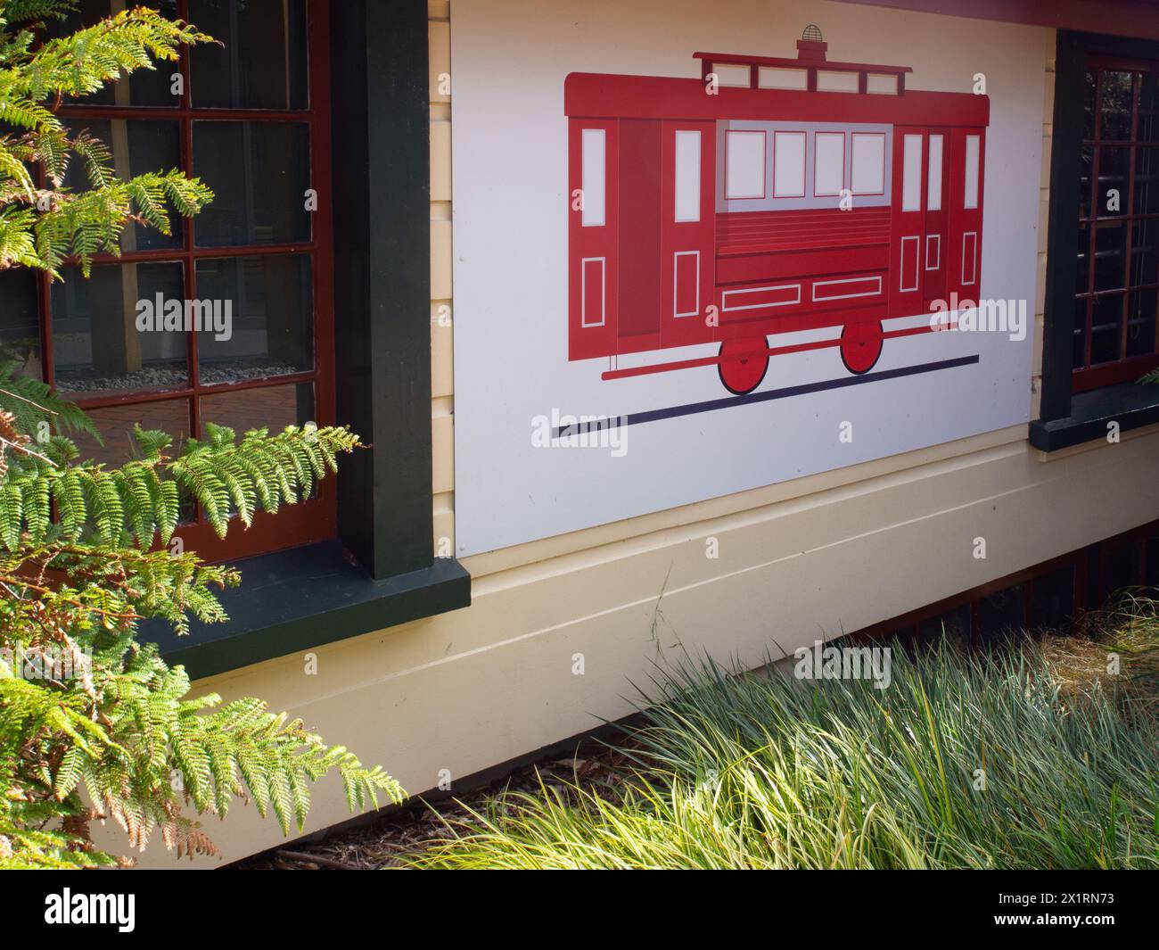 Red Cable Car Painting On A Wall Stock Photo - Alamy