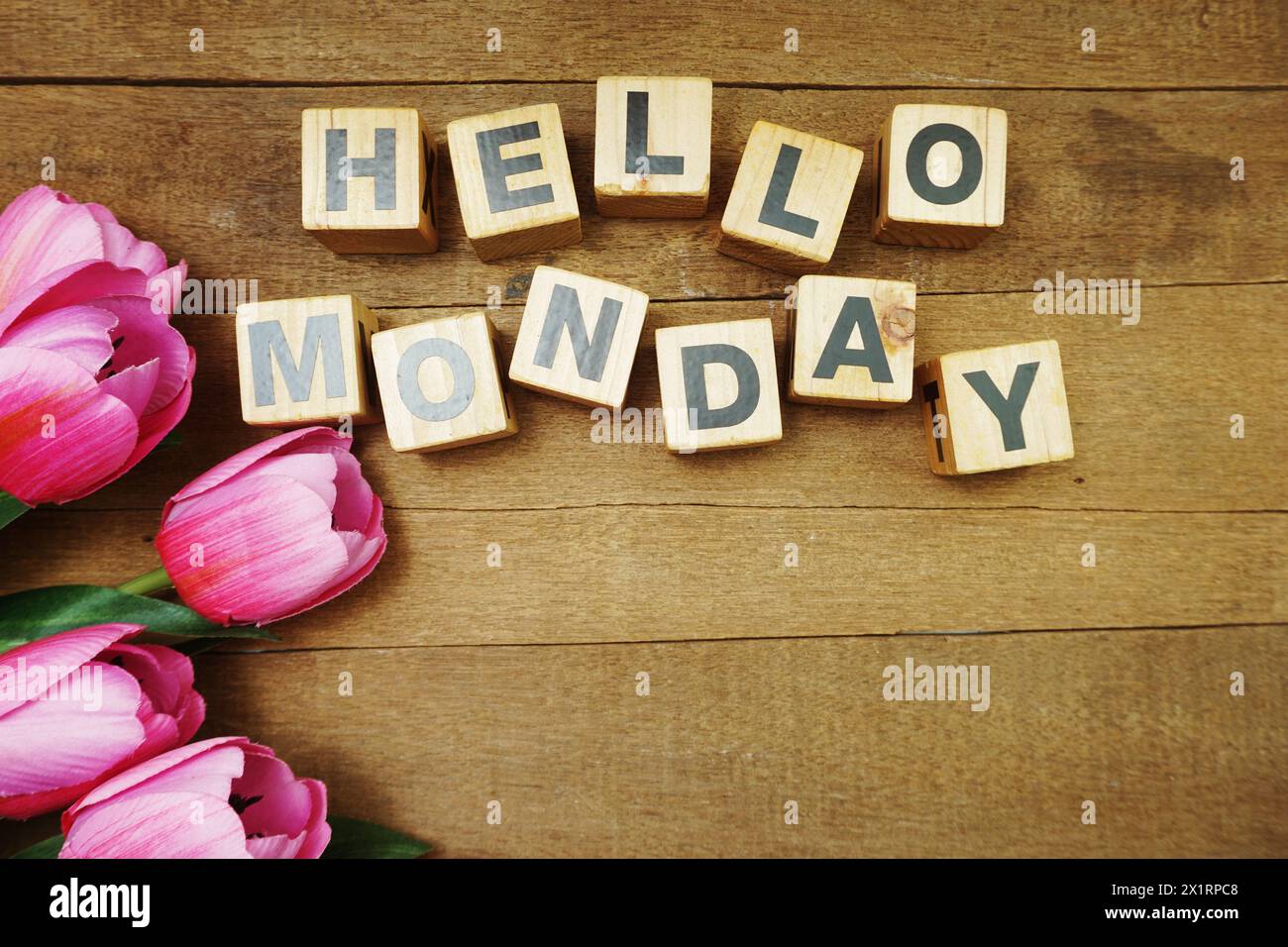 Hello Monday alphabet letters on wooden background Stock Photo - Alamy