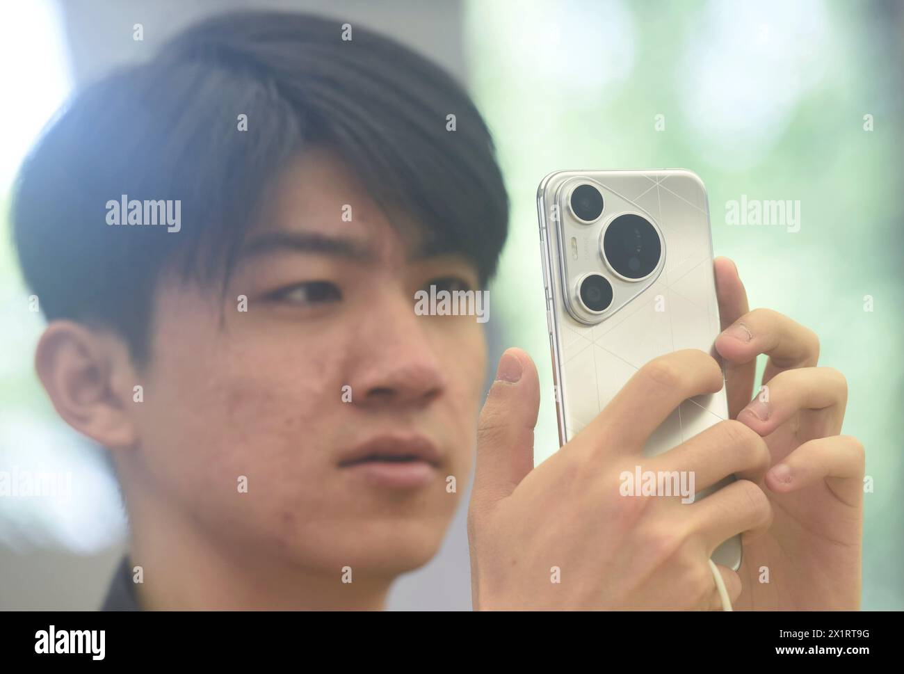 HANGZHOU, CHIAN - APRIL 18, 2024 - Customers experience various ...