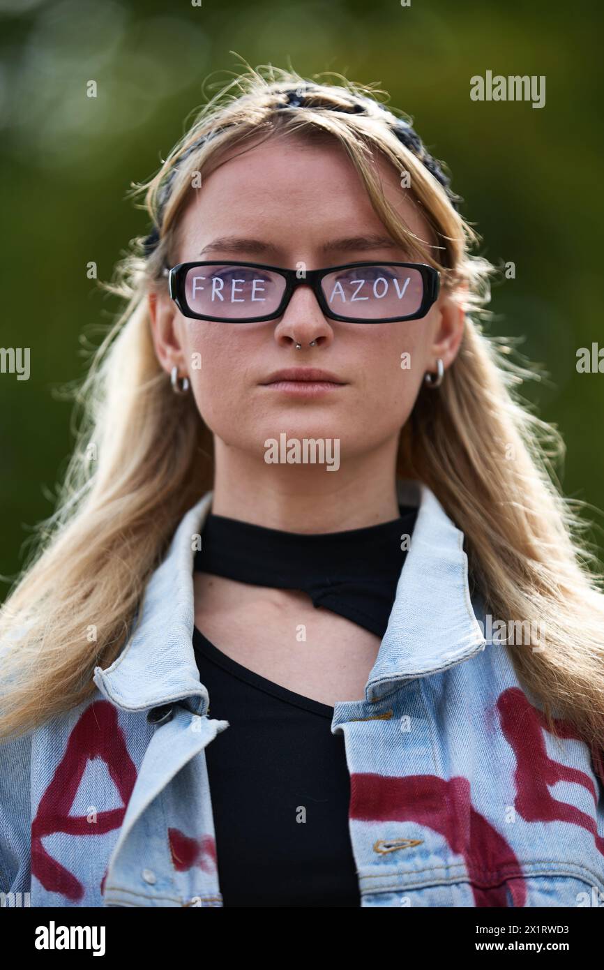 Ukrainian girl posing on a rally "Free Azov" dedicated to captured ...