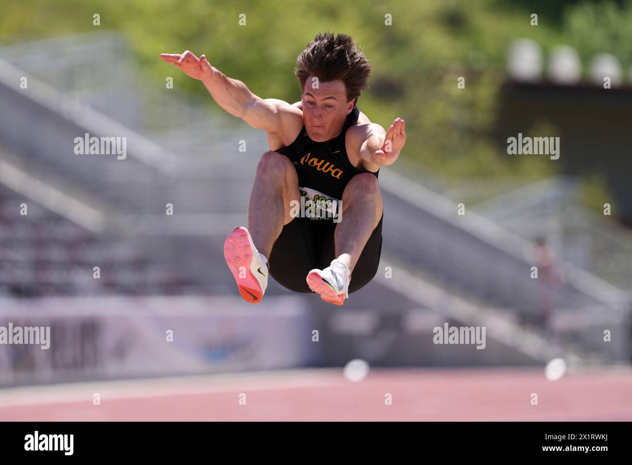 Austin West of Iowa jumps 25-2 (7.67m) in the decathlon long jump ...