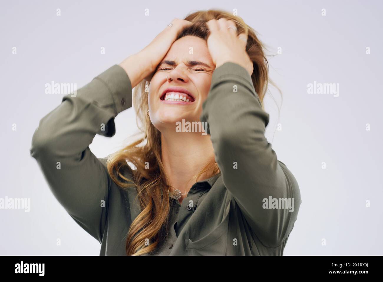 Woman, frustrated and pulling hair in studio for burnout, stress and ...