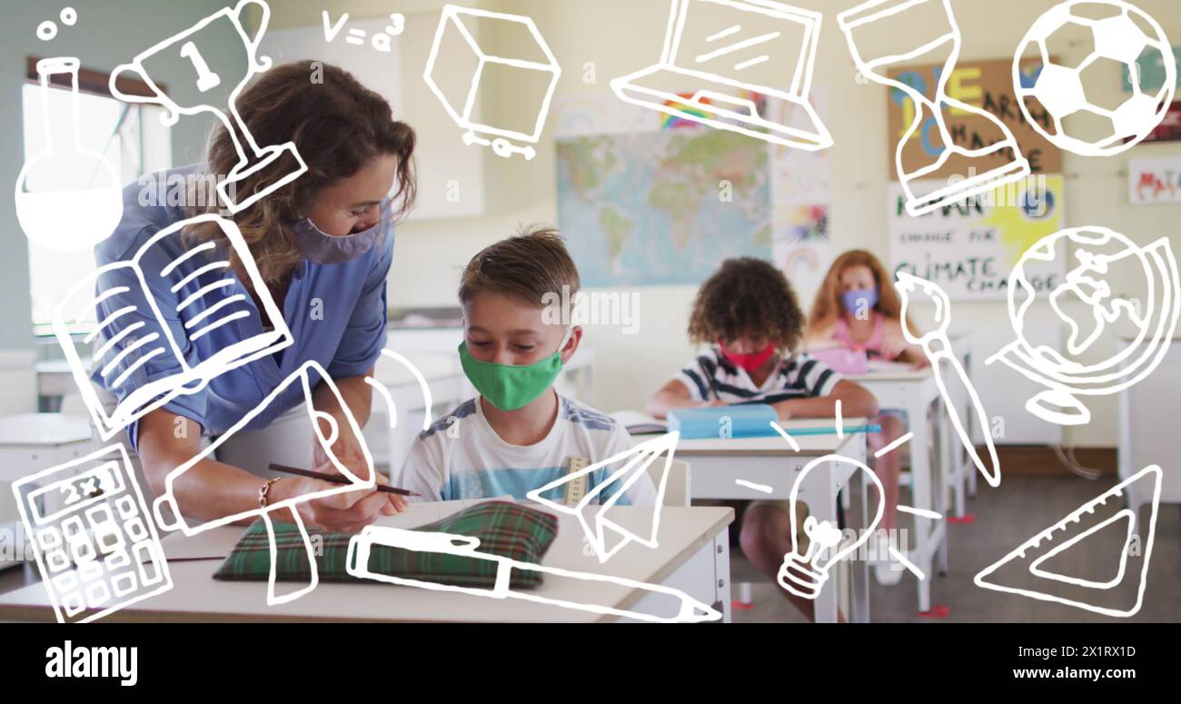 In school, a Caucasian teacher helps a Caucasian male student, while ...