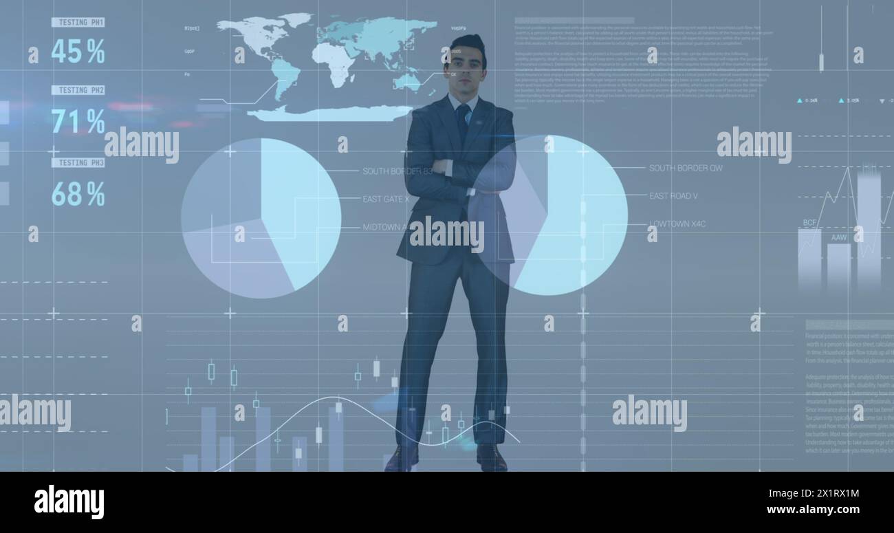 Caucasian male in suit stands before digital graphs. He has dark hair ...