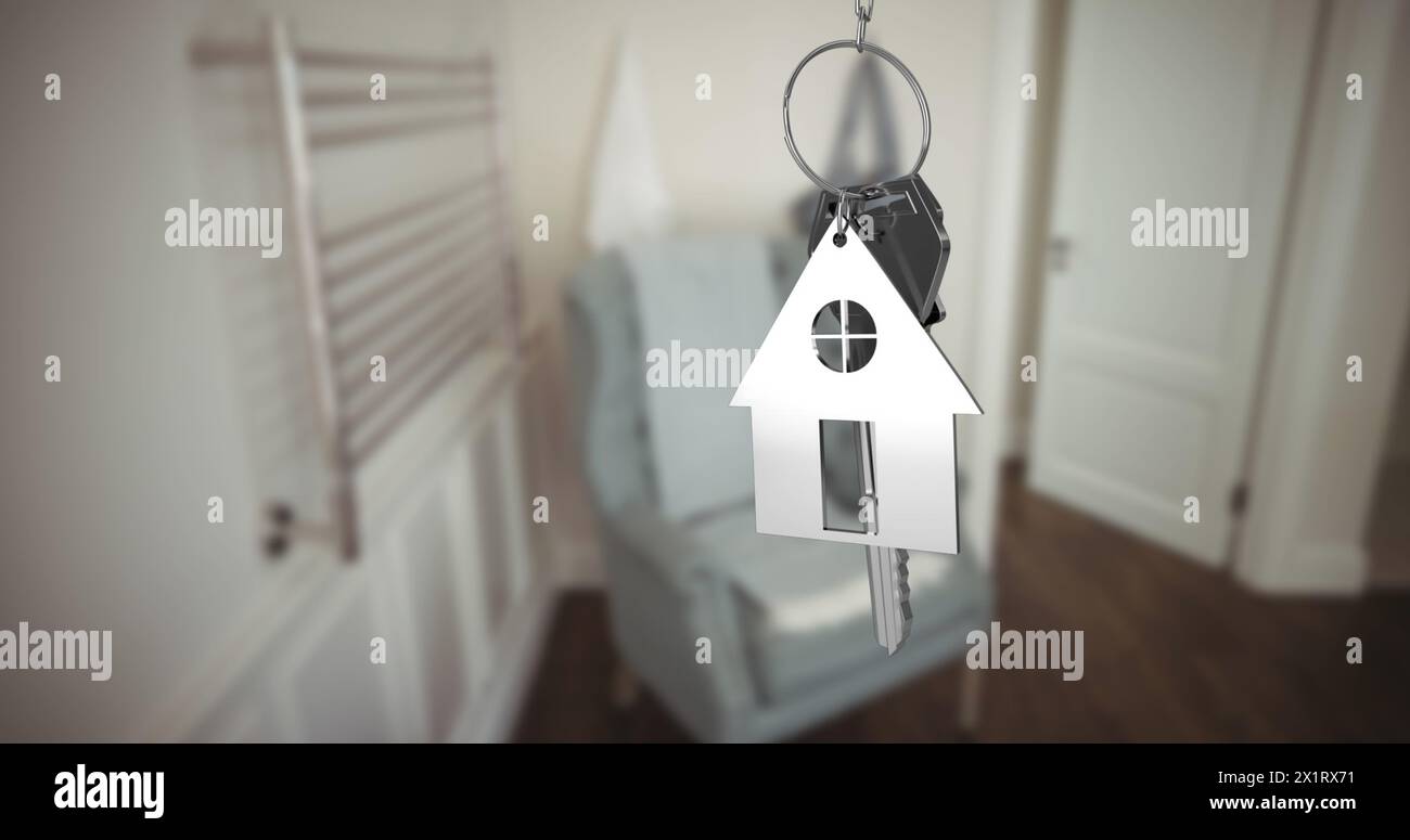 House-shaped keychain on keys implies home ownership Stock Photo - Alamy