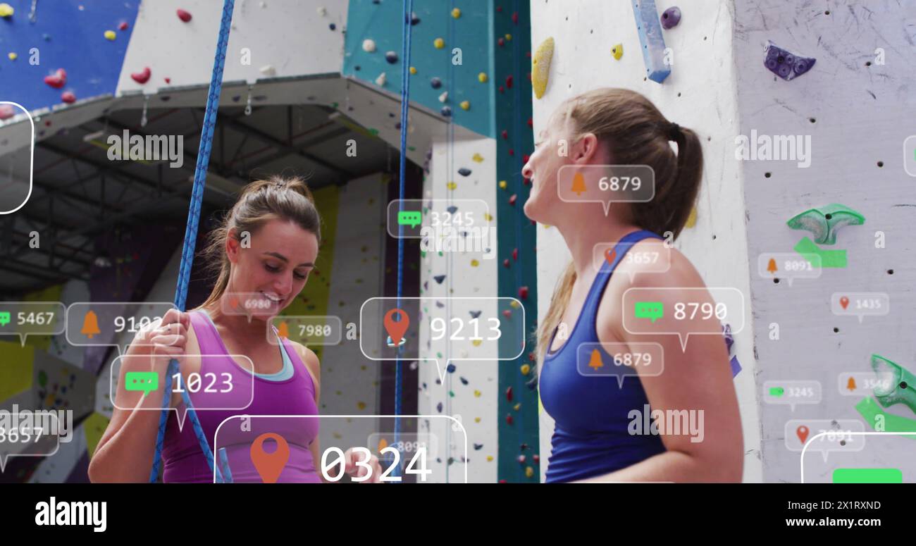 Two Caucasian women, business partners, are preparing to climb Stock Photo - Alamy