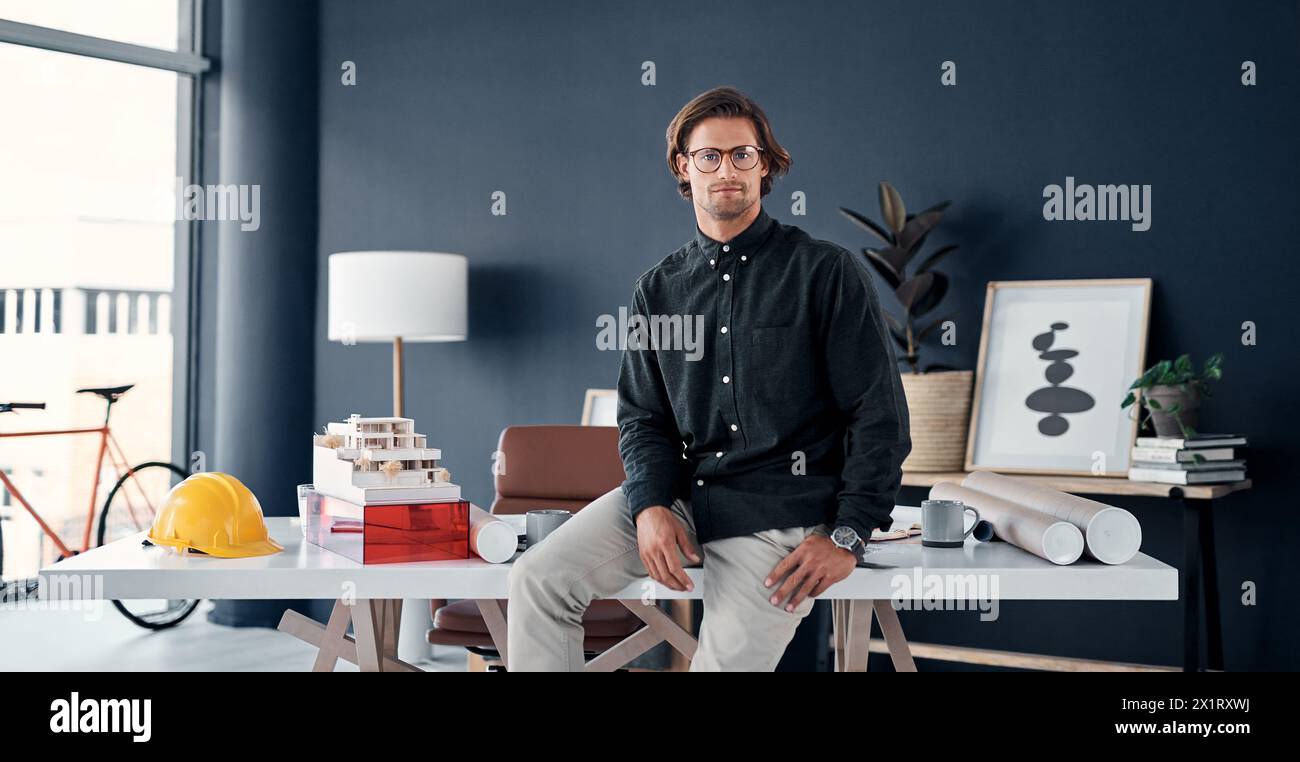 Man, architect and serious in portrait at desk in office, professional ...