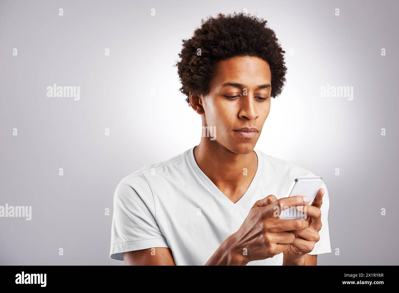 Man, typing and college student online with phone to watch meme video ...