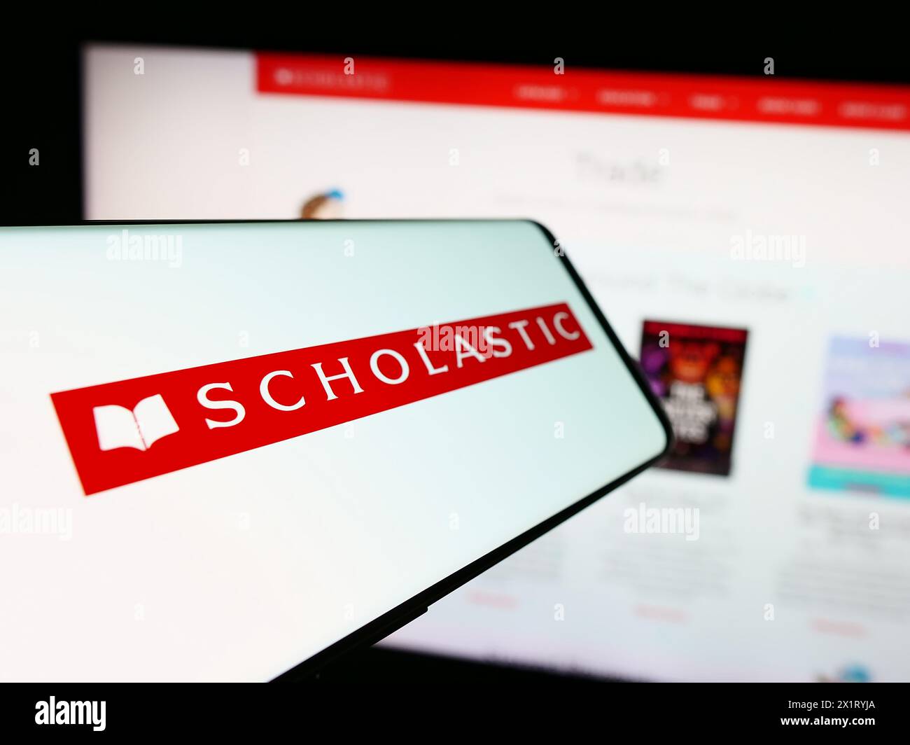 Mobile phone with logo of American publishing company Scholastic ...