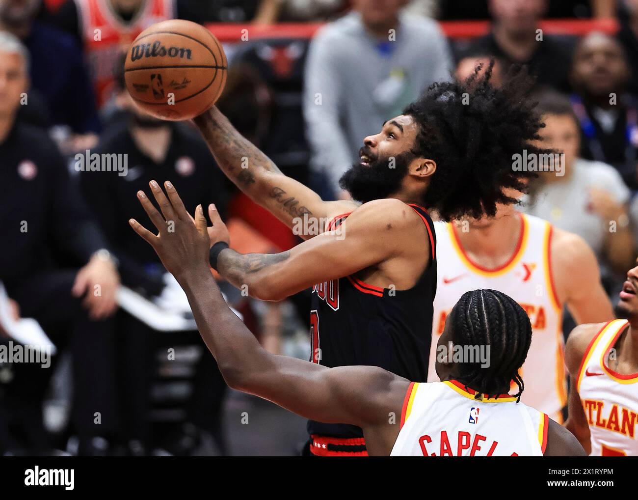 Chicago, USA. 17th Apr, 2024. Coby White (top) Chicago Bulls goes for a ...