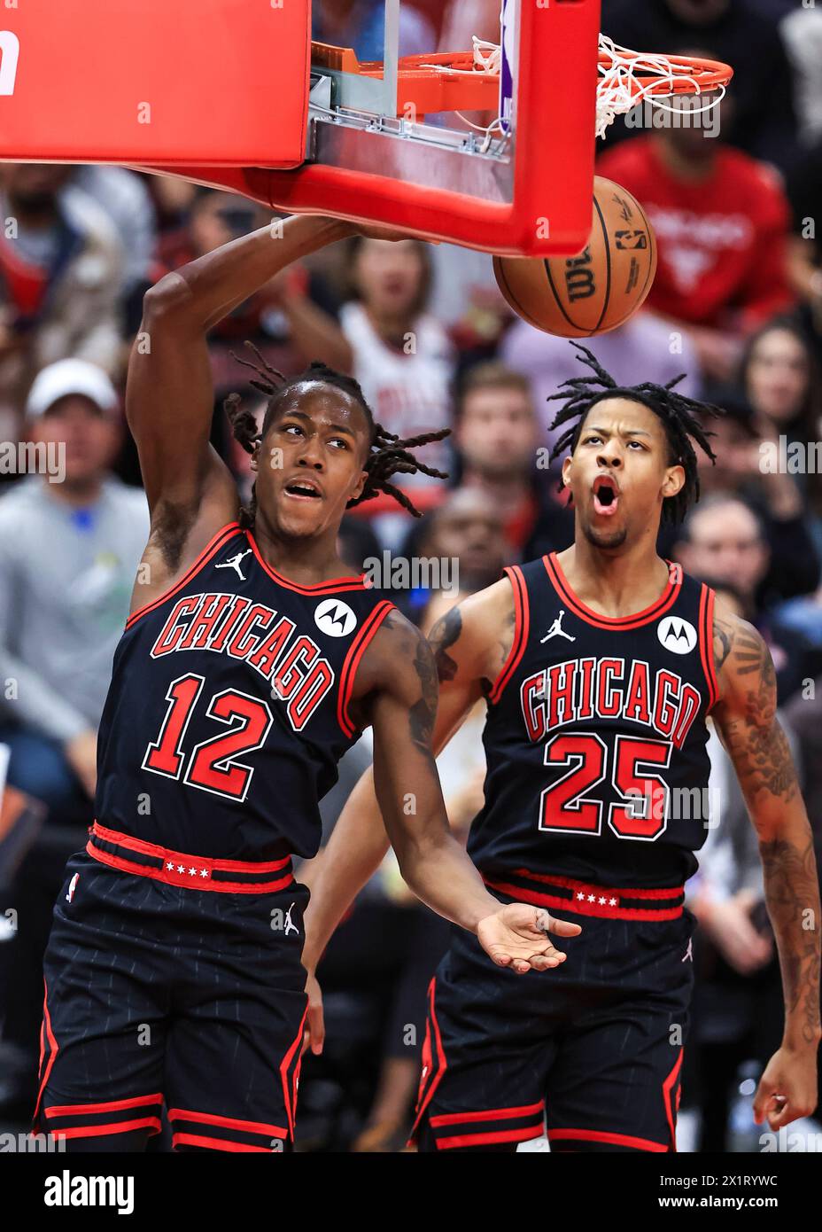 Chicago, USA. 17th Apr, 2024. Ayo Dosunmu (L) of Chicago Bulls dunks ...