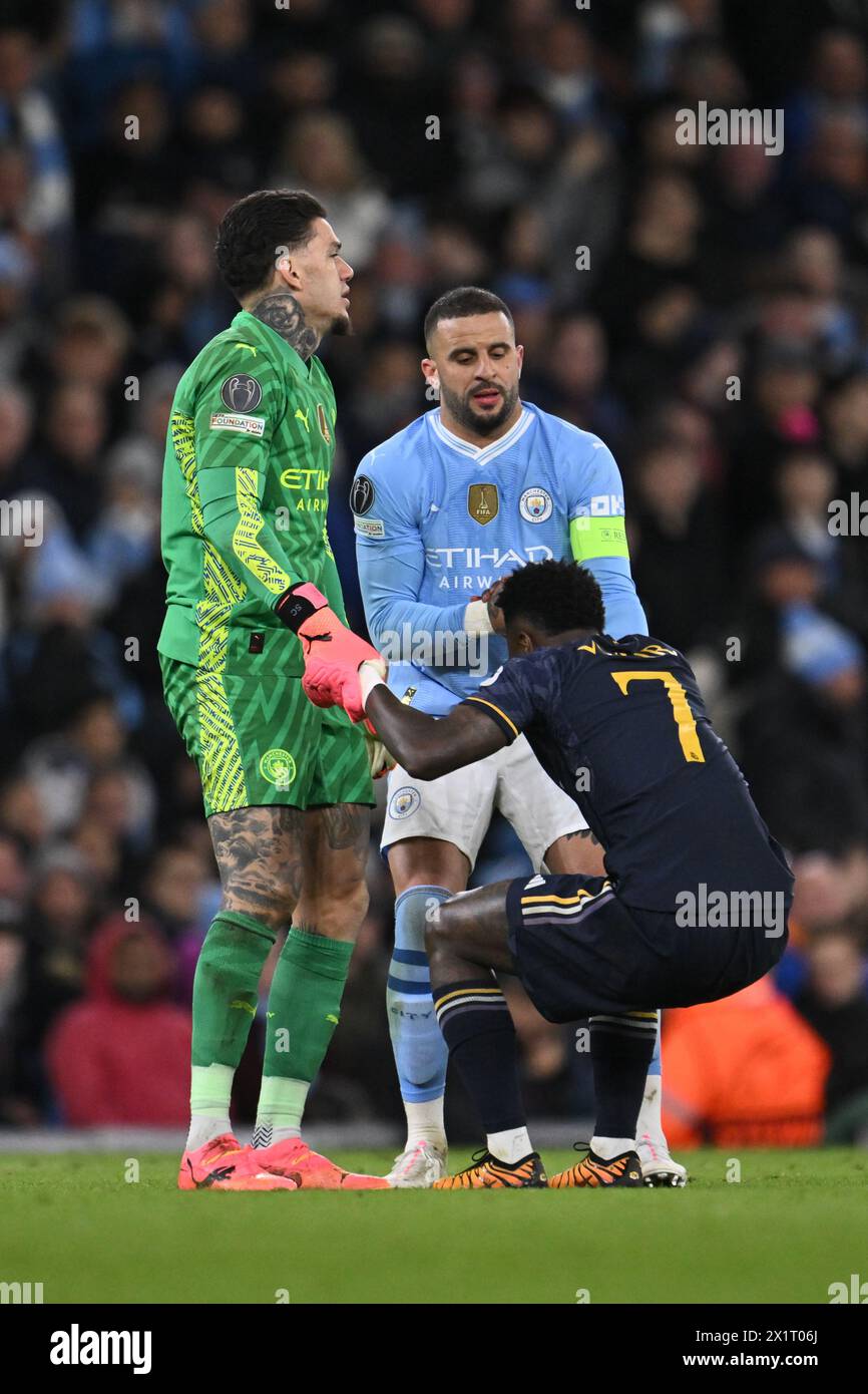 Manchester, UK. 17th Apr, 2024. Kyle Walker of Manchester City helps up ...