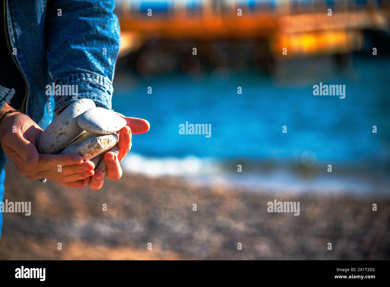 Experience the tactile connection with nature – rocks in the hands, a ...