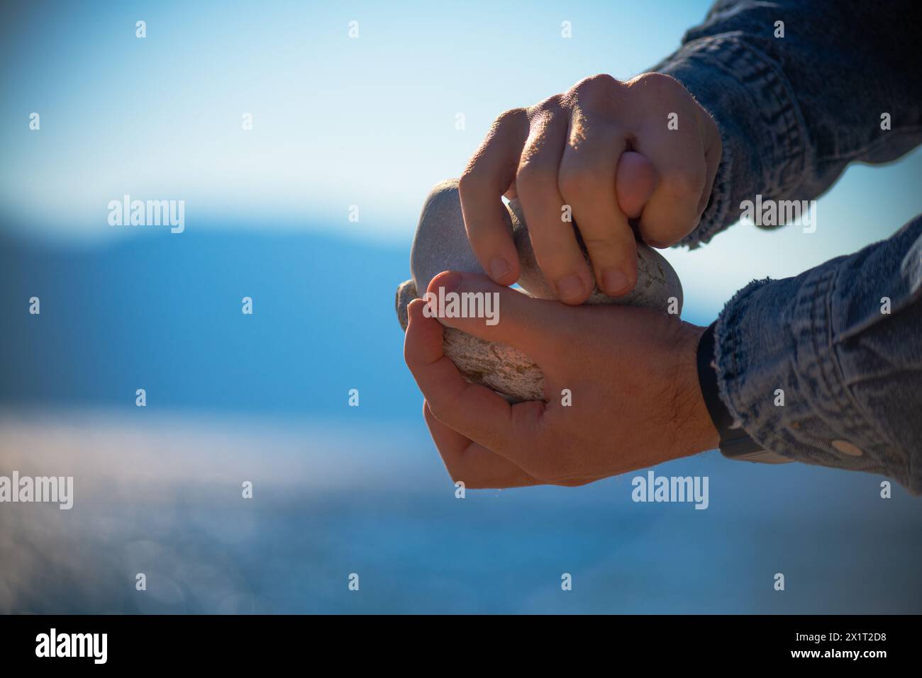 Experience the tactile connection with nature – rocks in the hands, a ...