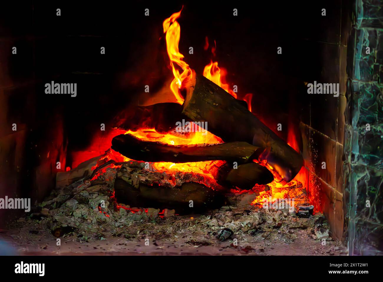 Witness the roaring hellfire as flames rage within the chimney, casting ...