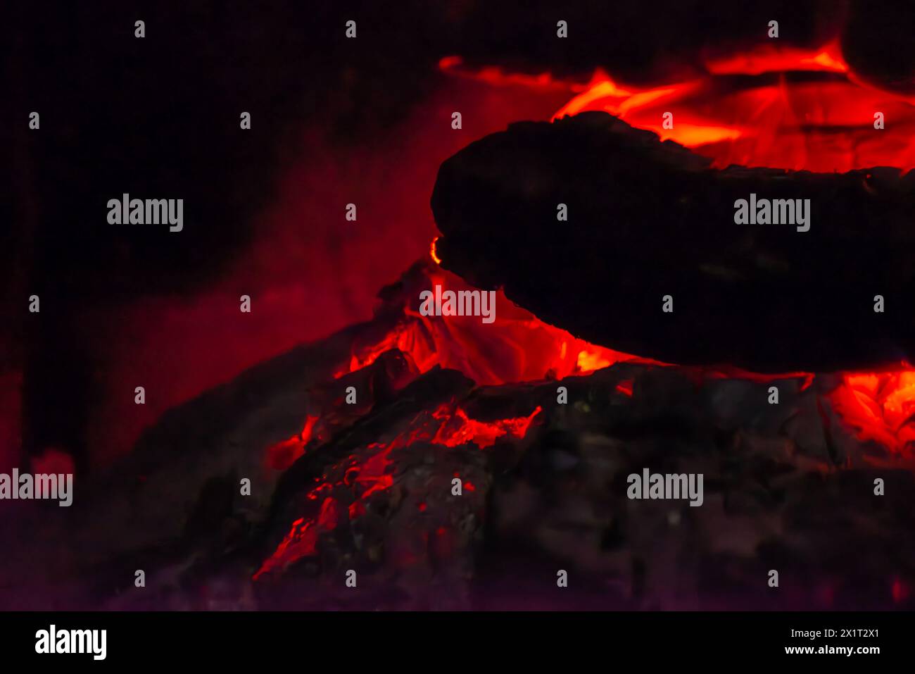 Capture the essence of inferno with a close-up of fiery wood fire ...