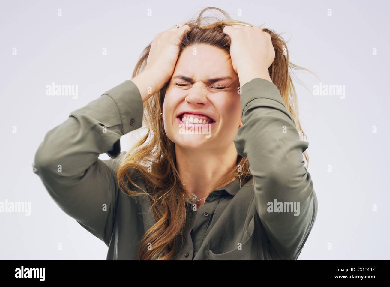 Woman, frustrated and pulling hair in studio for burnout, stress and ...