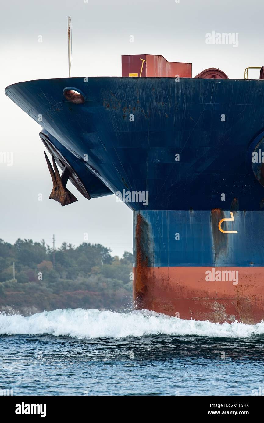 Big blue container ships bow with rusty anchors pushes a giant bow wave ... Big blue container ships bow with rusty anchors pushes a giant bow wave ...