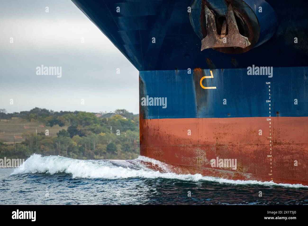Big blue container ships bow with rusty anchors pushes a giant bow wave ... Big blue container ships bow with rusty anchors pushes a giant bow wave ...