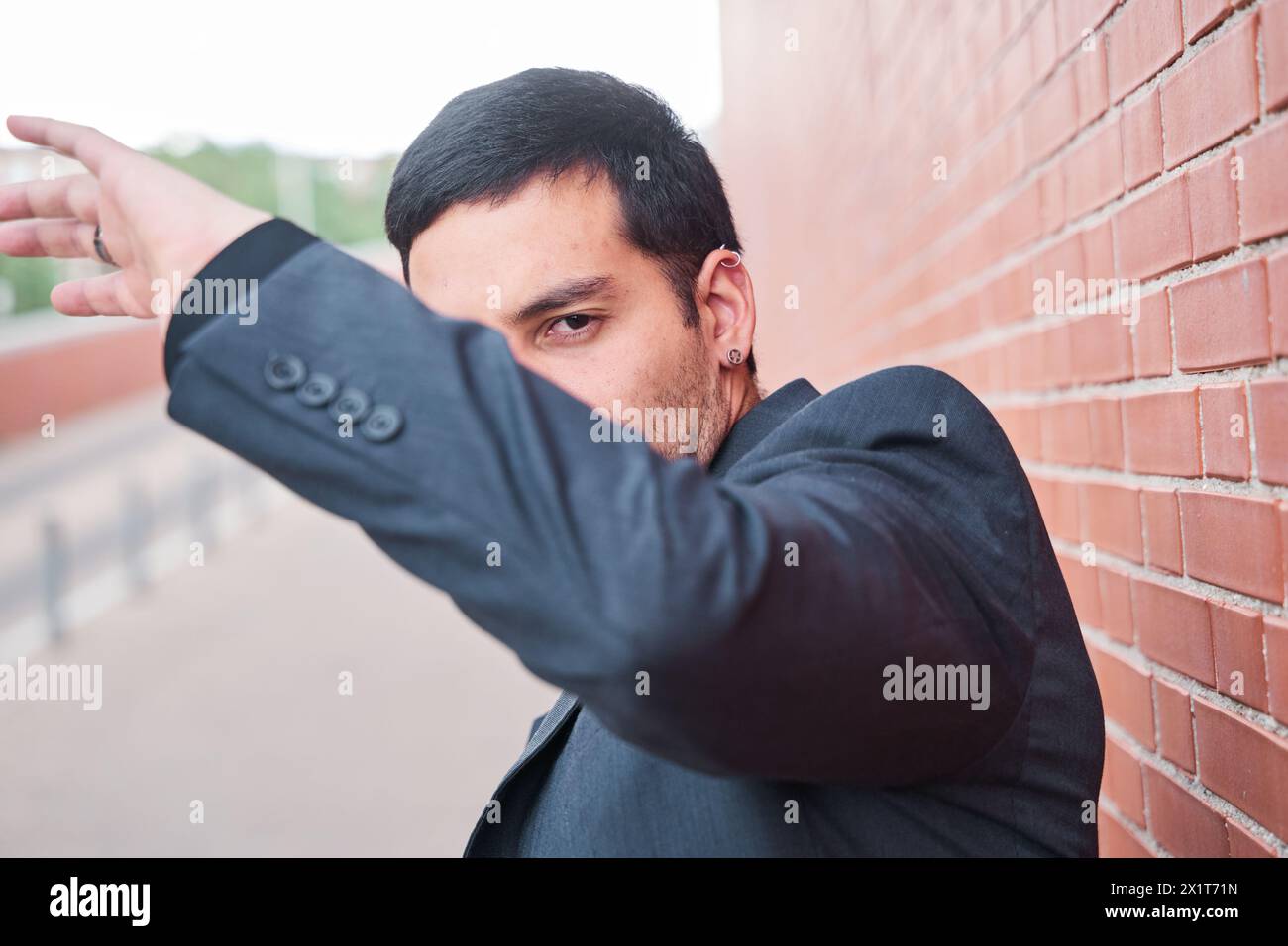 Happy man putting arm hi-res stock photography and images - Alamy