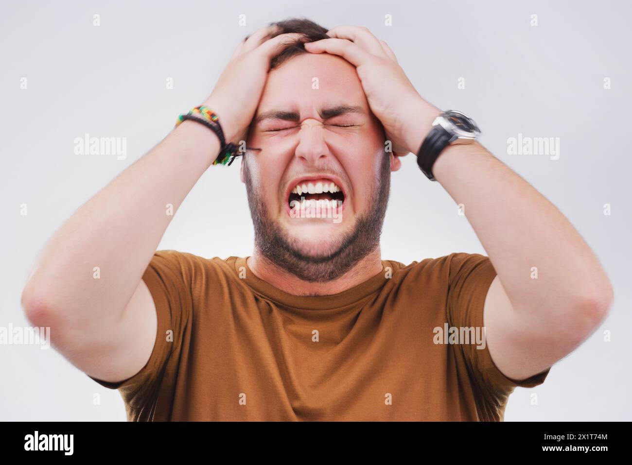 Anger, burnout and frustration with annoyed man in studio isolated on ...