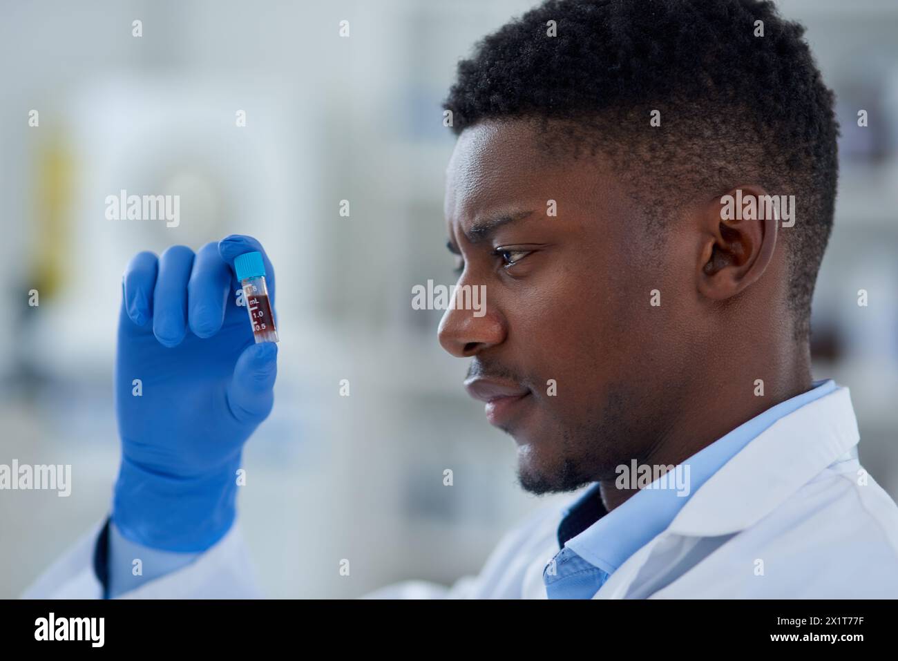 Expert, laboratory and black man with vial, blood and pharmaceuticals ...