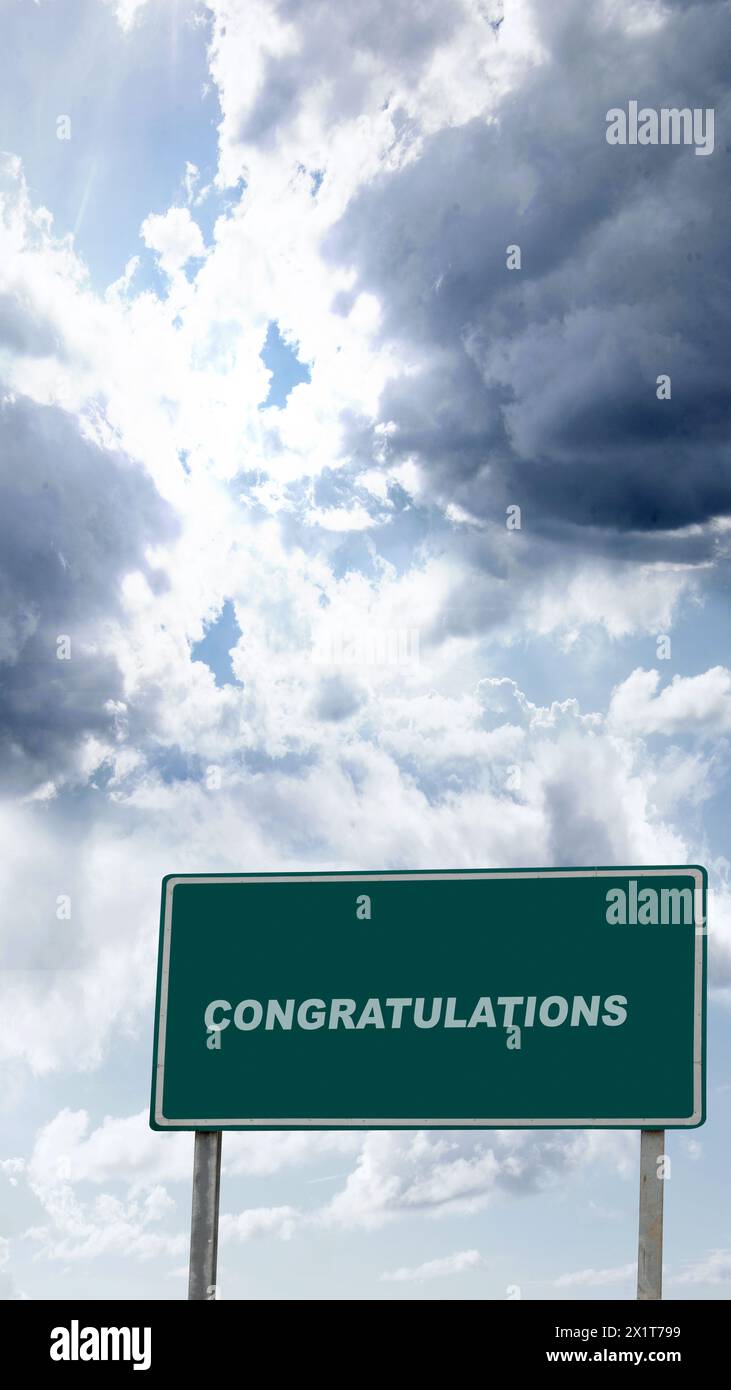 Road sign with Congratulations text on blue sky background. Congratulation concept Stock Photo ...