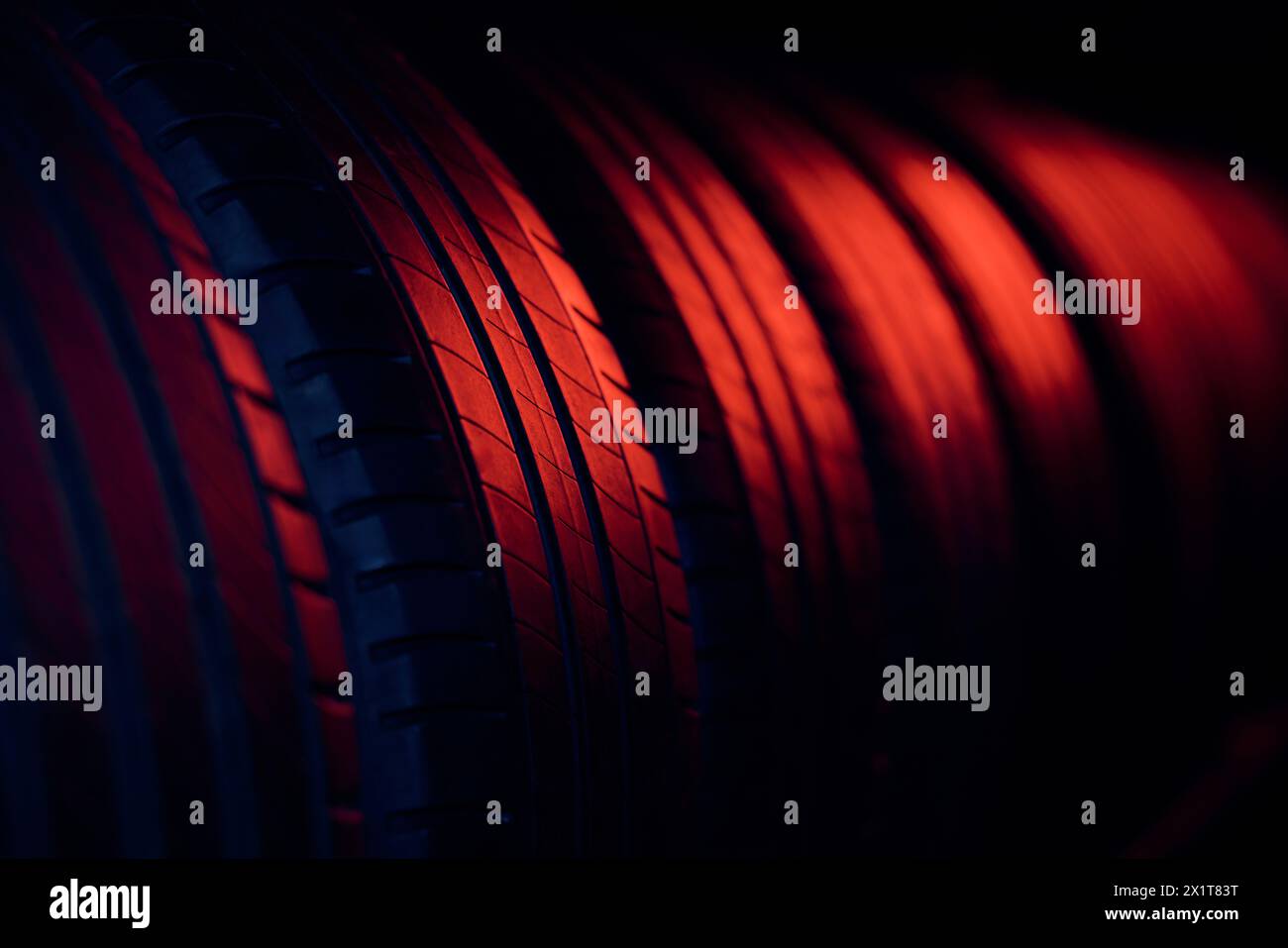 Abstract red car tires background Stock Photo - Alamy