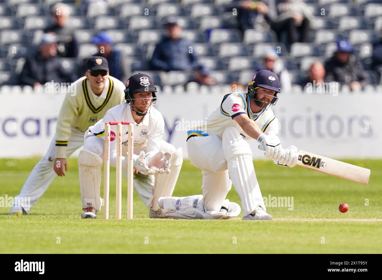 Bristol, UK, 14 April 2024. Yorkshire's Adam Lyth (right) plays a sweep ...