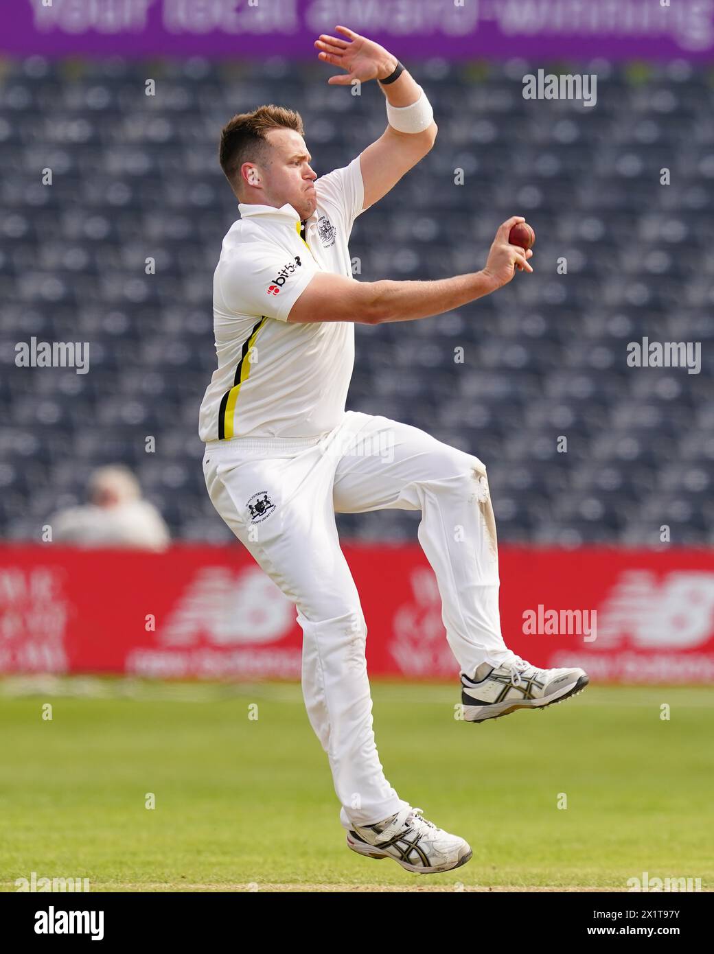 Bristol, UK, 14 April 2024. Gloucestershire's Josh Shaw bowls during ...