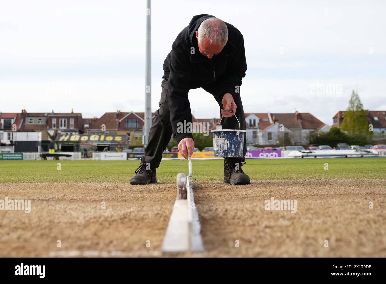 Bristol, UK, 14 April 2024. Ground staff work on the pitch during the ...