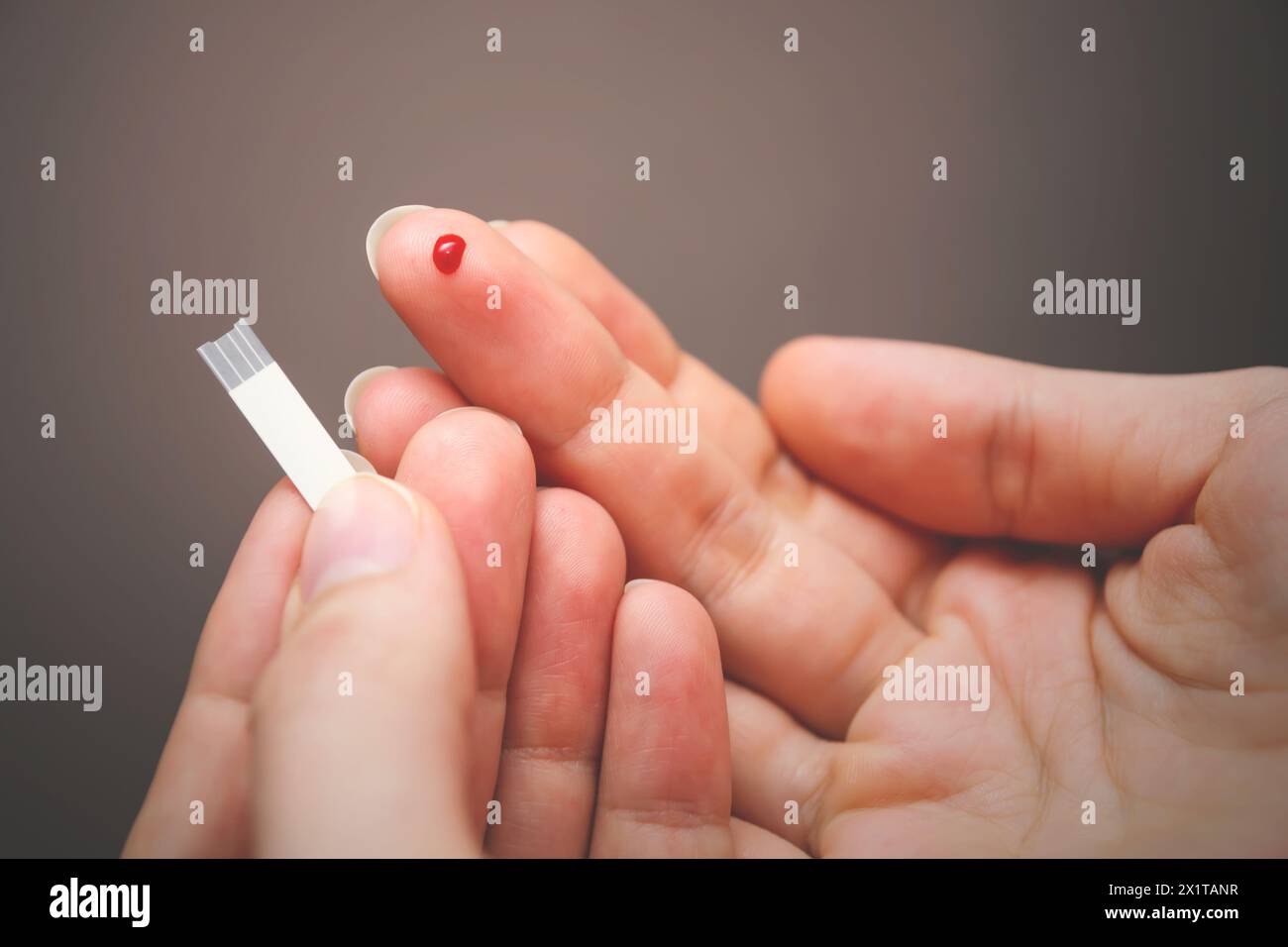 Drop of blood on fingertip for a medical exam. Diabetes disease Stock ...