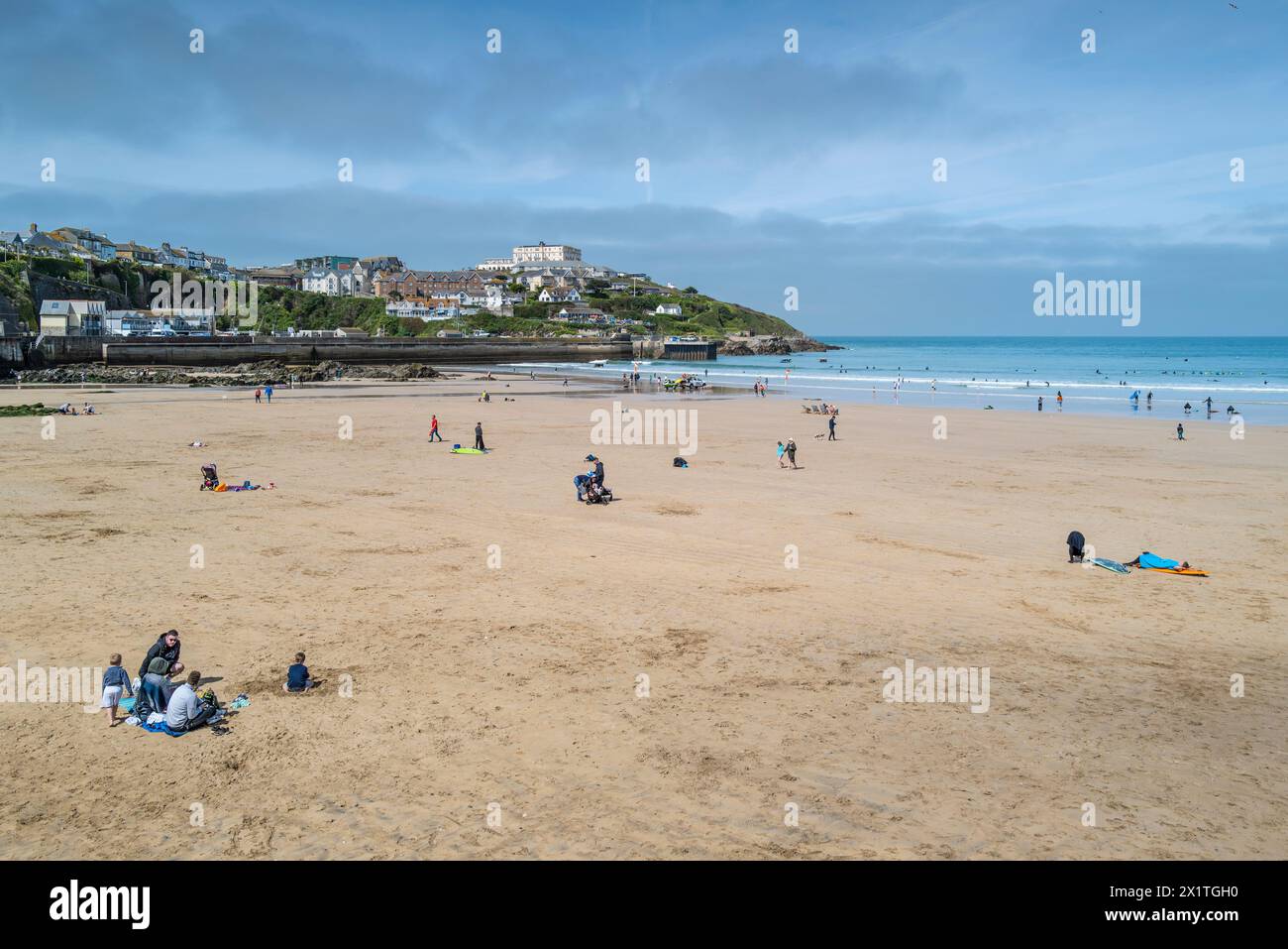 People on Towan beach at low tide in Newquay in Cornwall in the UK ...