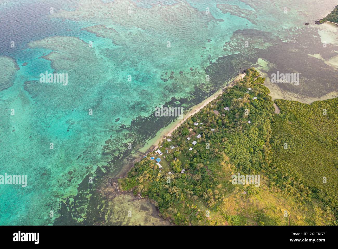 Fiji Islands. Turquoise waters of ocean wash island covered tropical ...